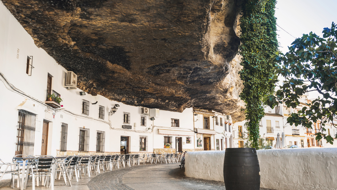 This town is built under massive cliffs and is becoming a must-visit ...