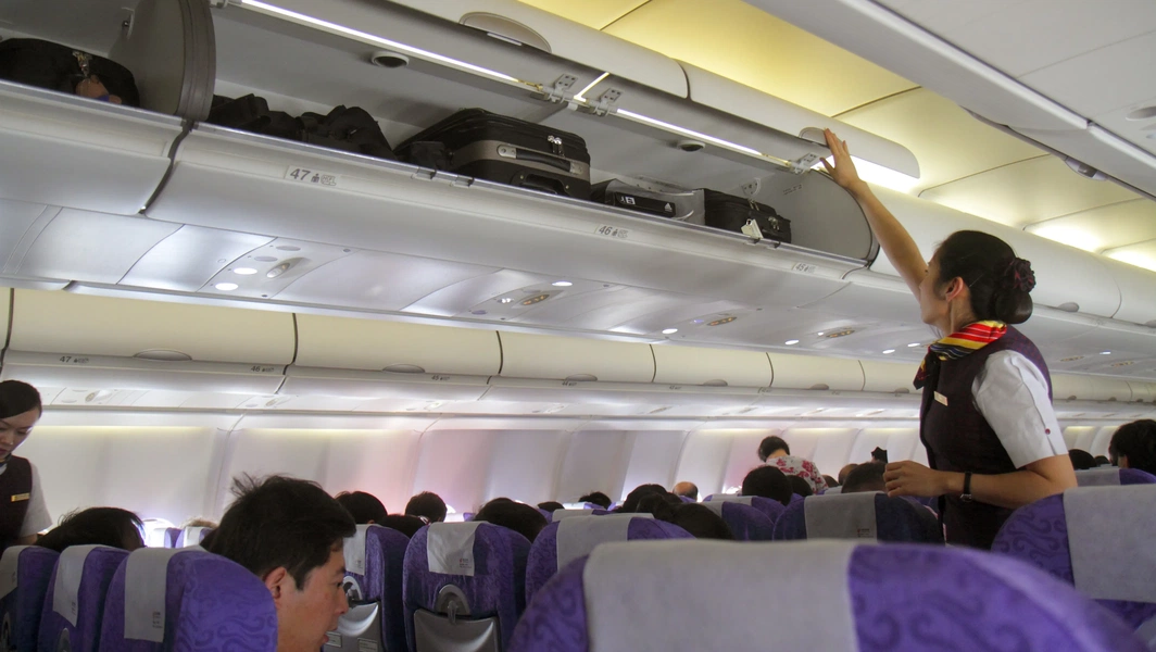 6 polite habits flight attendants prefer you skip