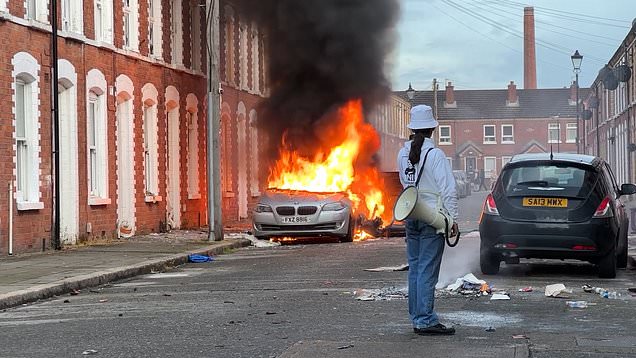 Cars set on fire in Belfast following protests