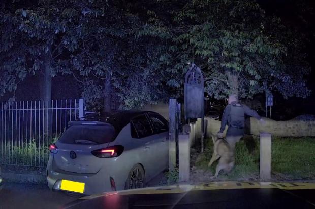 Driver arrested after crashing car into gate and wall