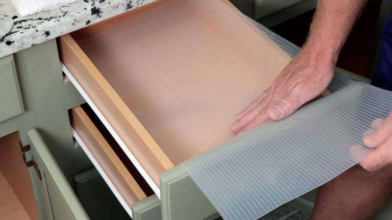 Use old drawer liners to elevate candles with a sweet DIY