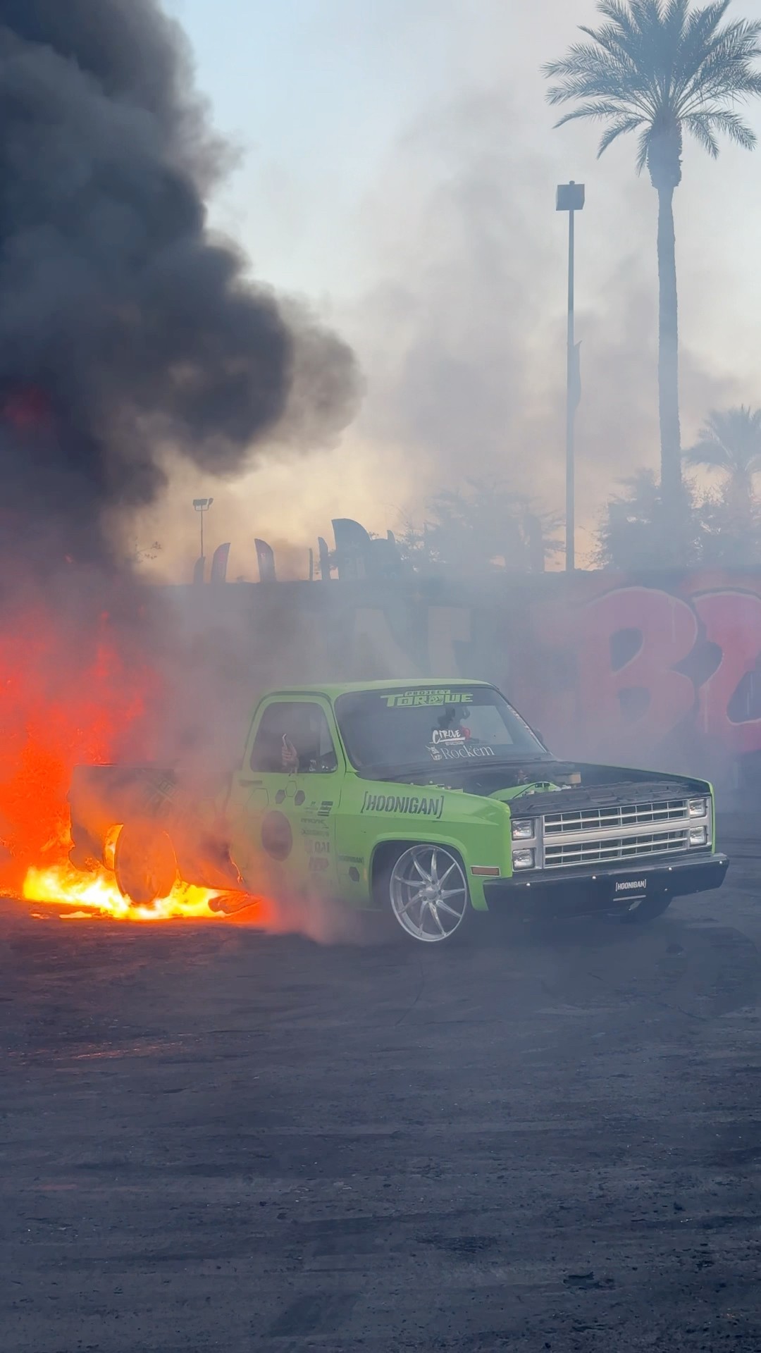Burning pickup spins through thick smoke!
