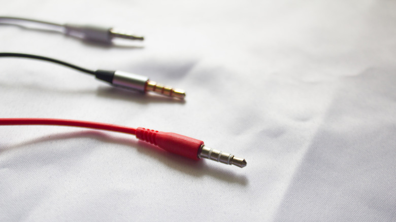 Why do headphone jacks have multiple black rings, and what do they mean?