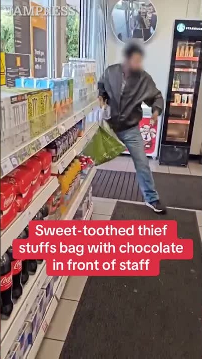 Sweet-toothed thief stuffs bag with chocolate in front of staff #themirror