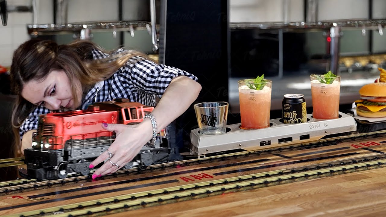 Inside awesome restaurant delivering food via tiny trains