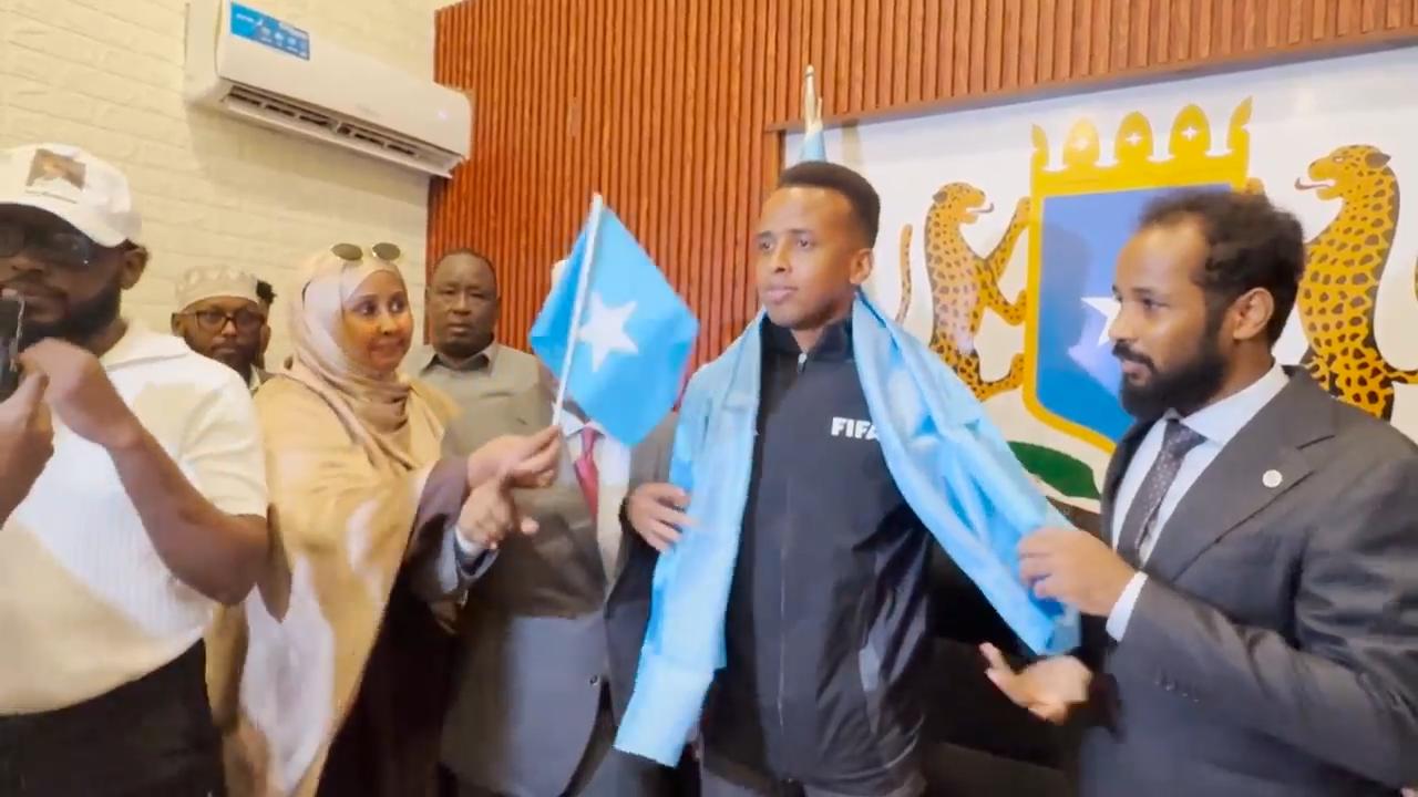 Somali World Cup referee denied entry to US arrives home to hero's welcome