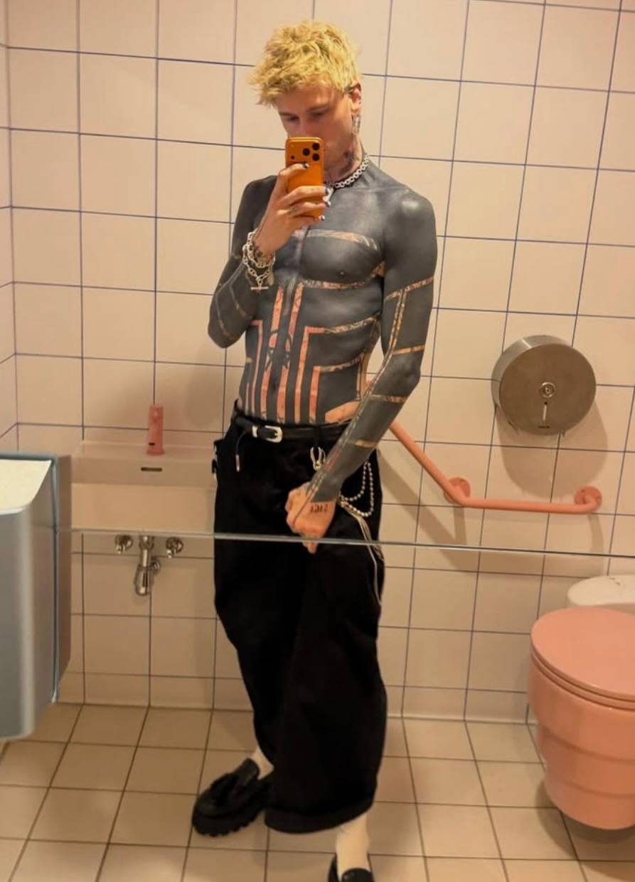 Machine Gun Kelly shared reason for covering body in blacked out tattoo ...
