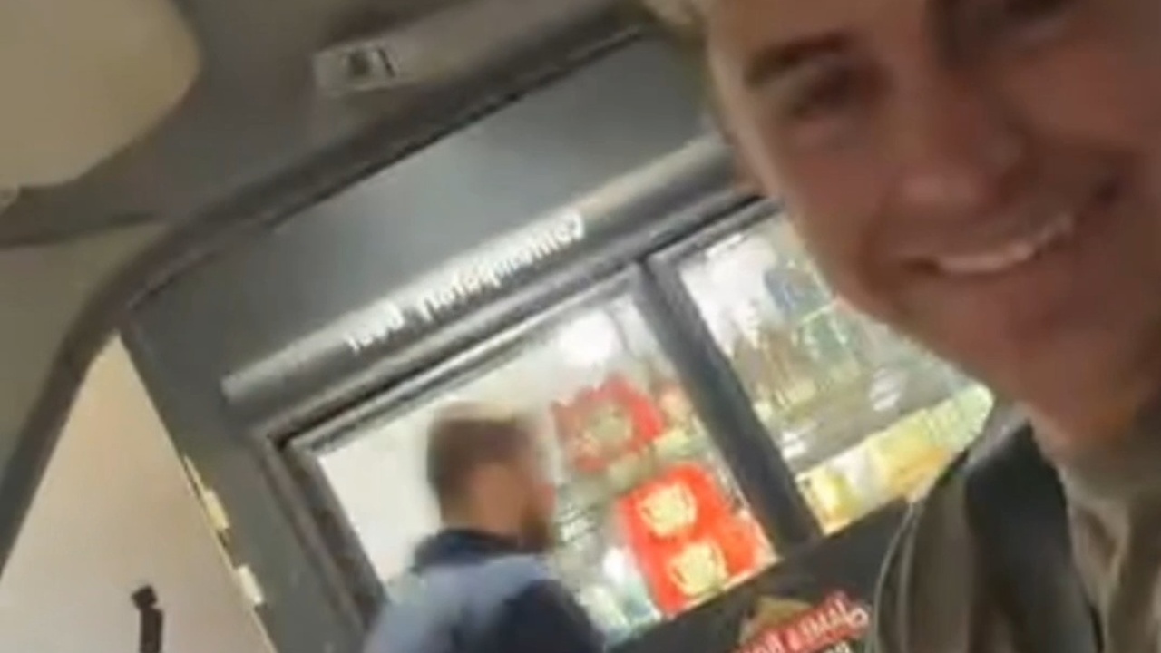 Drive-through order continues after a window drops inside the door