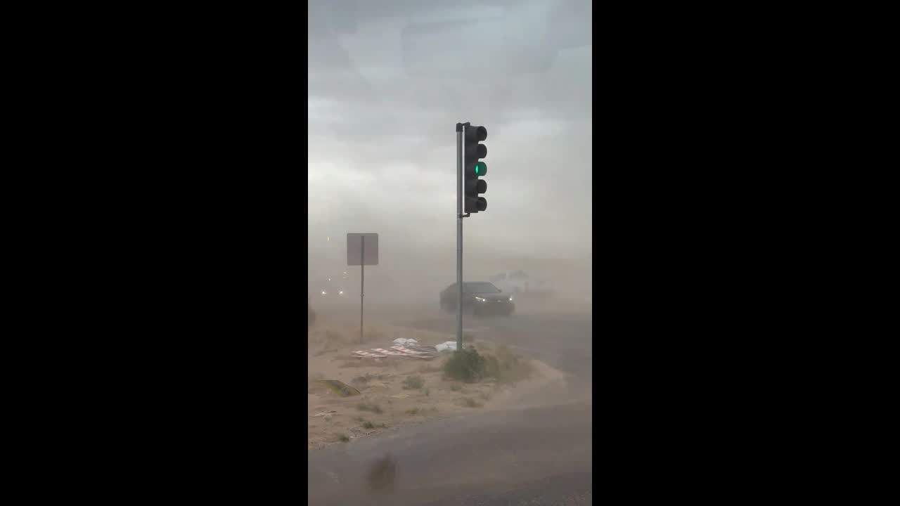 Massive dust storm reduces visibility on road in New Mexico, USA