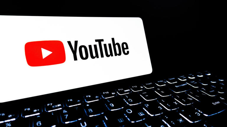 What does a highlighted comment mean on YouTube?