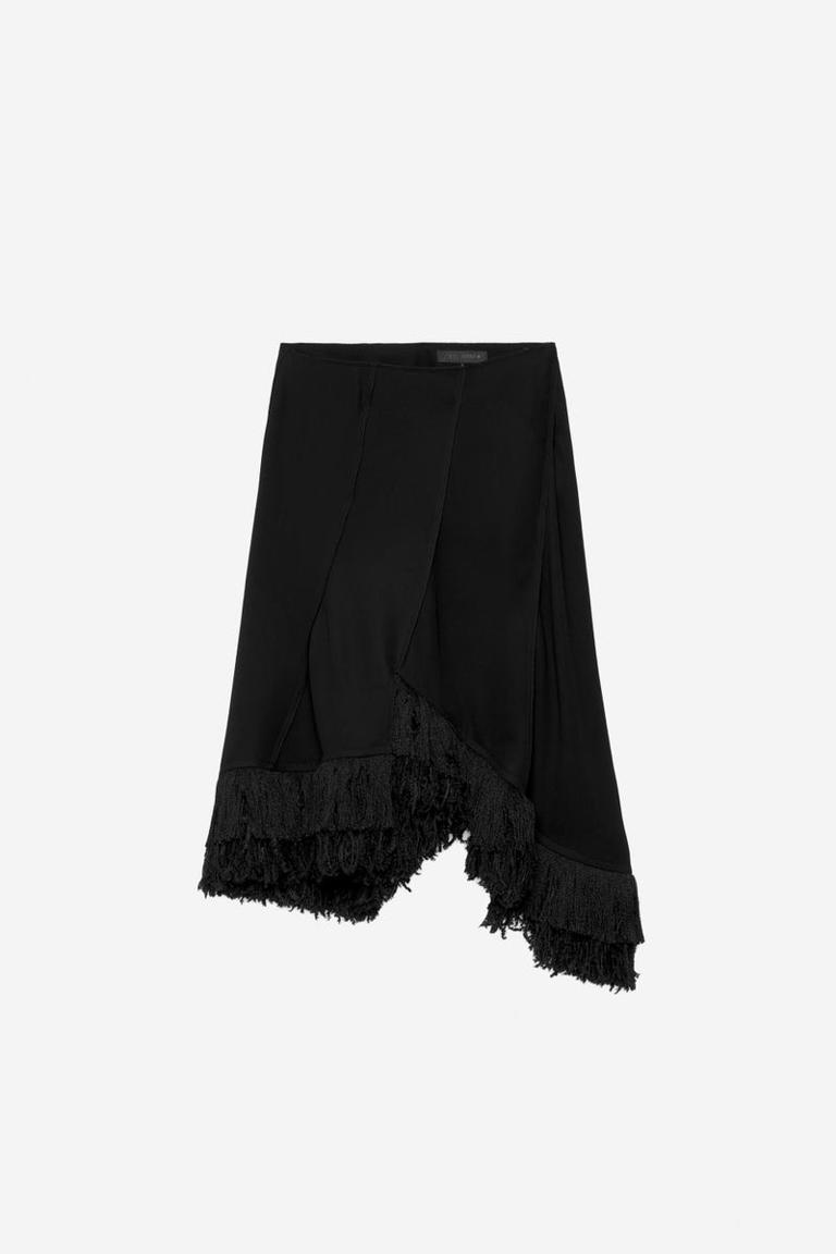 Black midi skirts are trending for summer – and Zara's fringed style ...