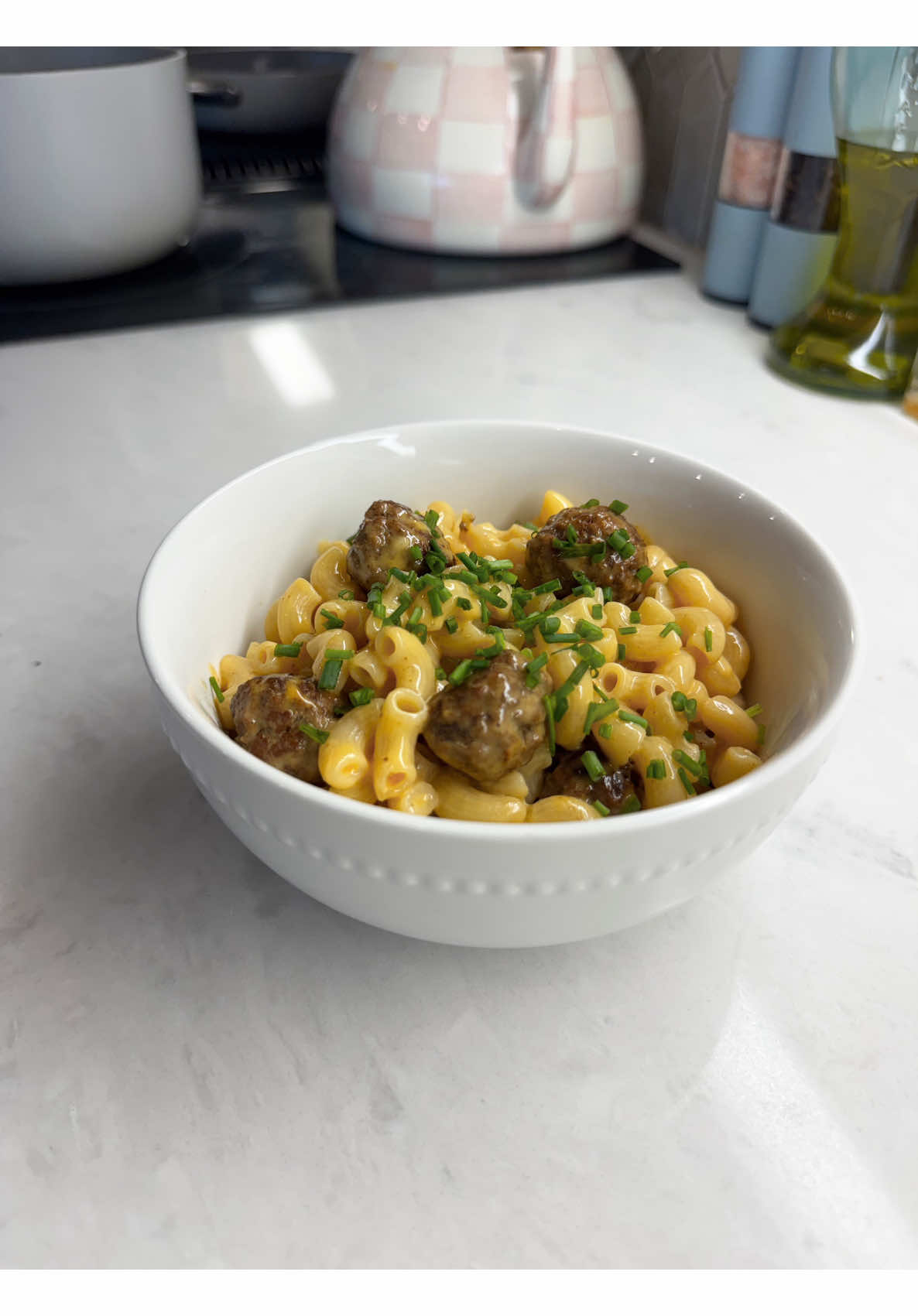 Creamy mac and cheese with savory meatballs and fresh chives for the ...