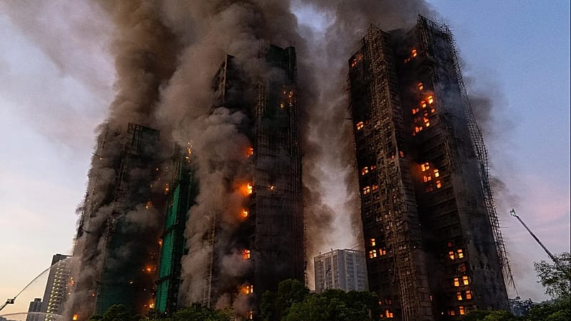 Hong Kong charges seven people and two firms over massive fire that ...