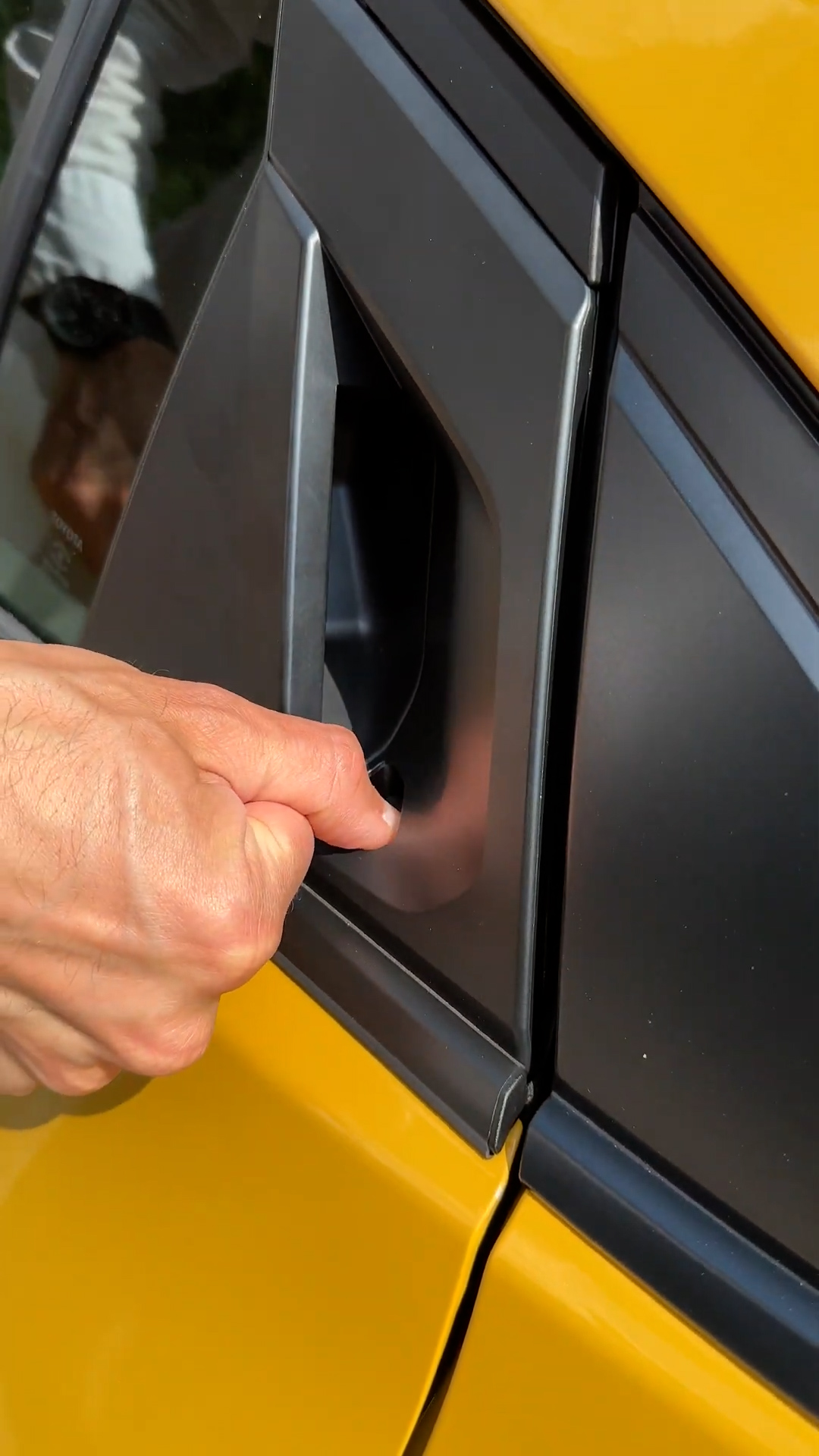The hidden rear door handle of the Toyota Prius