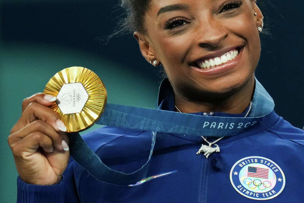 Simone Biles defies gravity to become gymnastics' GOAT