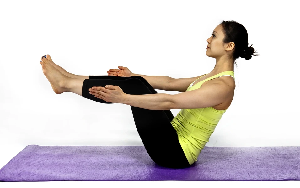 25-minute yoga flow builds strength beyond abs