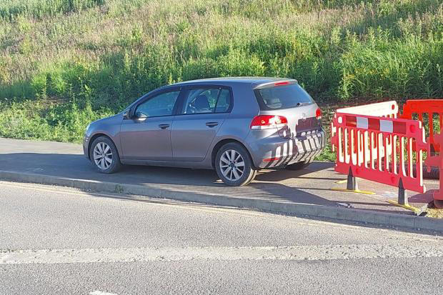 Police take action as two cars promptly seized for parking wholly on ...