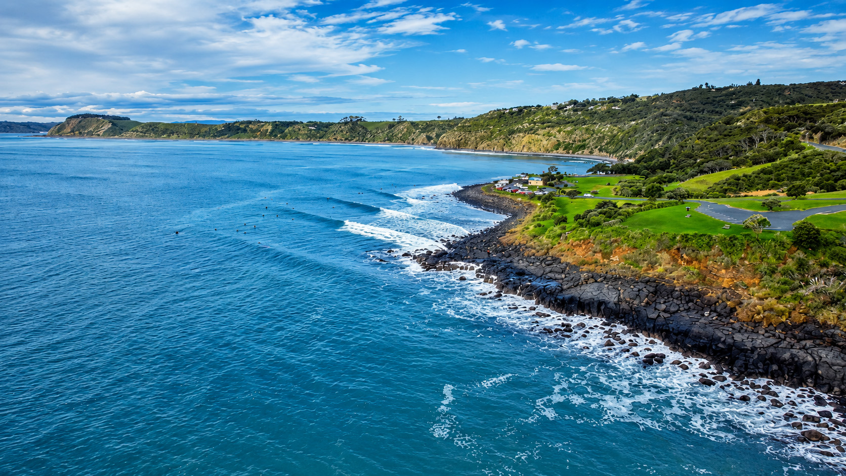 Manu Bay’s legendary left-hand wave rolling along Raglan’s coast