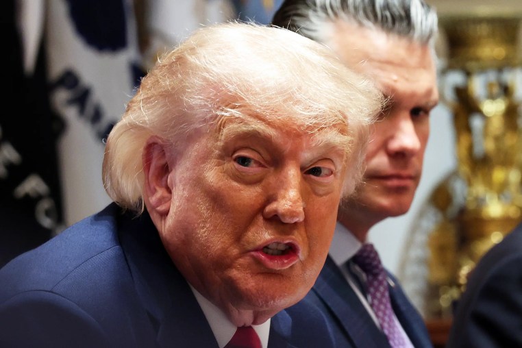 Trump peddles more mixed messages after accusing Iran of downing a US ...