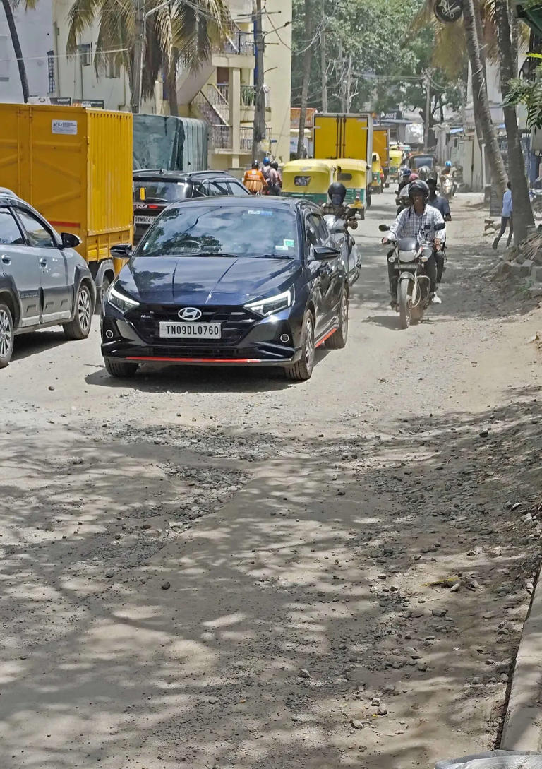 Potholes, dug-up stretches turn Haralur Road in Bengaluru into extreme ...