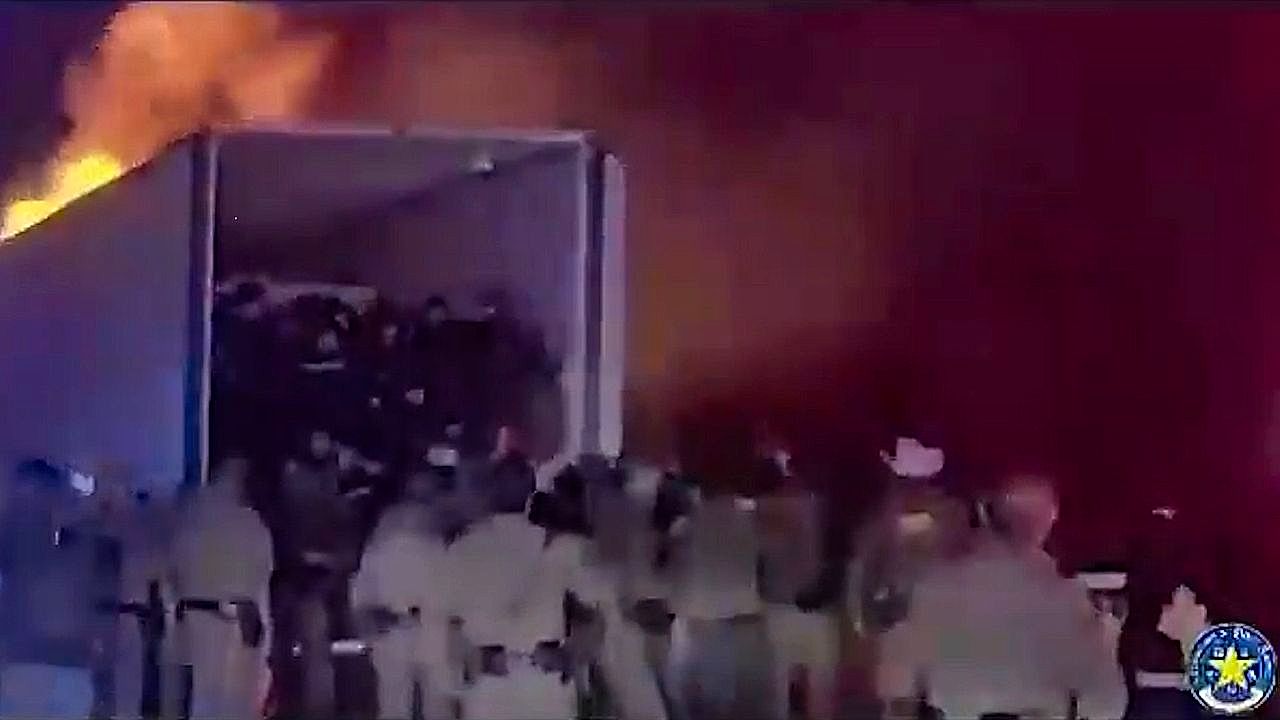 39 migrants rescued from burning tractor-trailer after high-speed chase ...