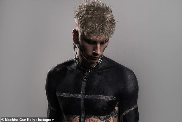 Machine Gun Kelly shares intense physical toll of his blackout tattoo