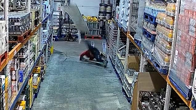 CCTV captures moment worker falls through roof onto warehouse floor