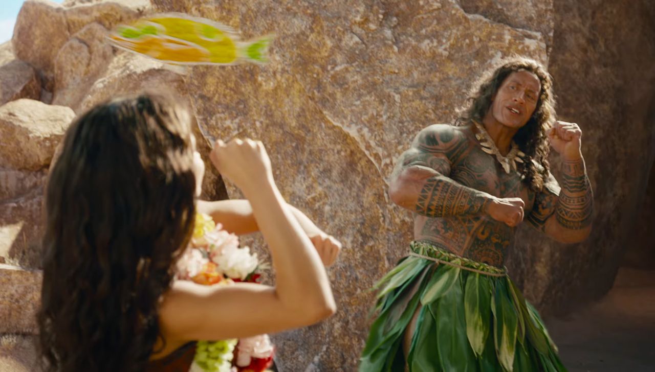See Dwayne Johnson sing, dance and conquer massive crabs in the "Moana ...