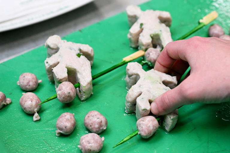 Bavarian sausage queen makes meat footballers for World Cup
