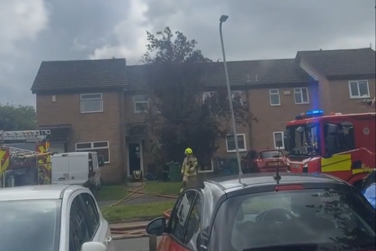 Smoke billows from house as fire crews tackle blaze on Cardiff street