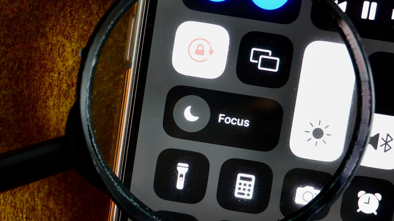 What does the half-moon that shows up at the top of your iPhone mean?
