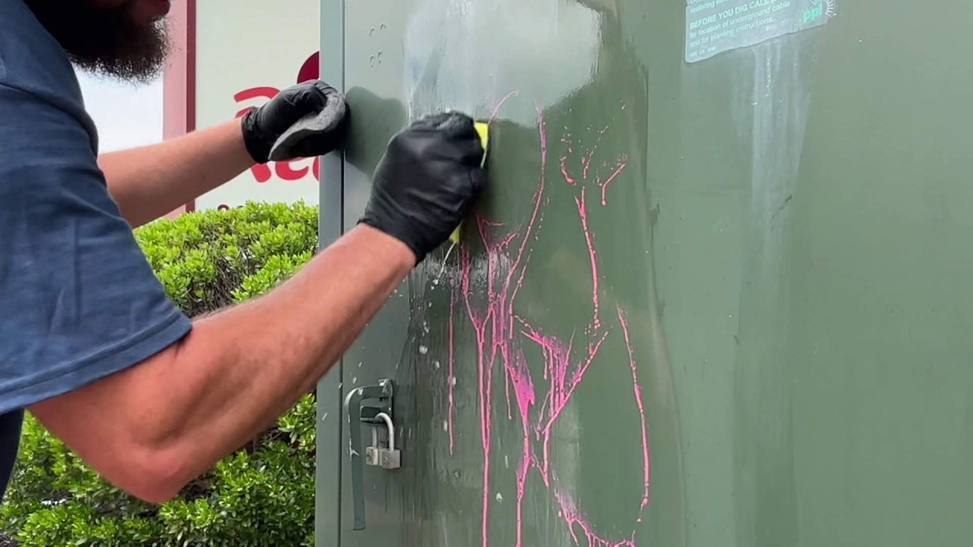 Construction company helps give back to community through graffiti cleanup