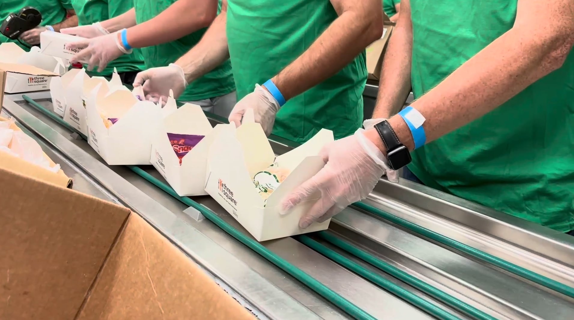 Athletics players pack meals at Three Square Food Bank during Las Vegas ...