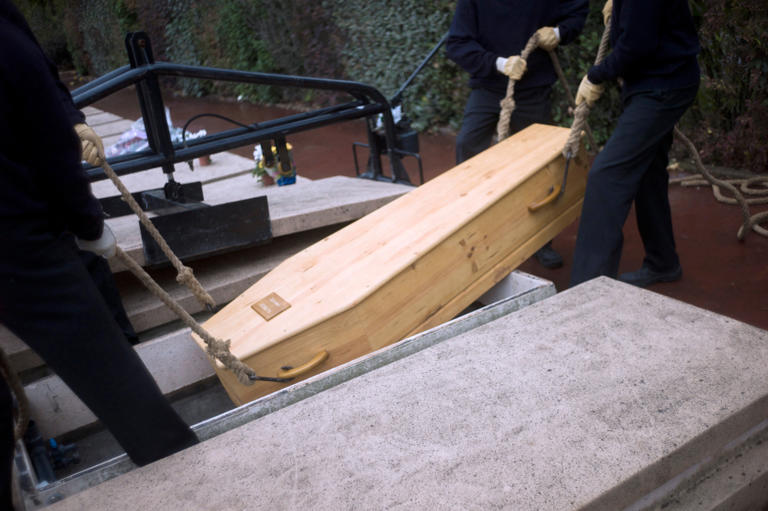 Widow sues after late husband’s body falls from casket during burial