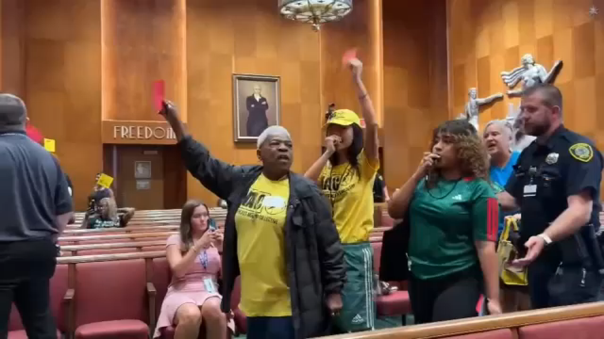 Protests erupt at Houston City Hall after council passes Mayor Whitmire ...
