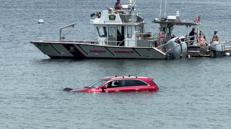 Stolen car found in water after Mass. high school field damaged