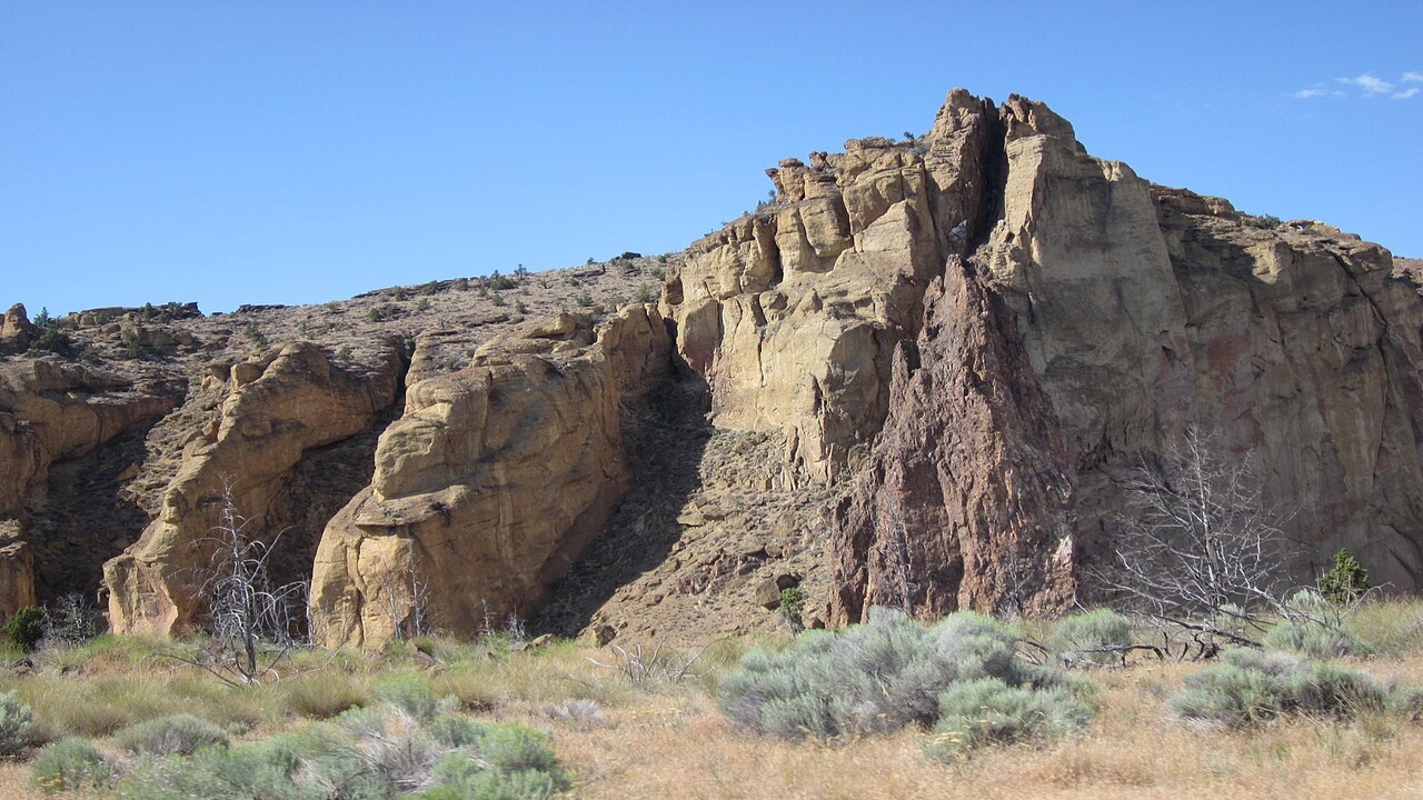 Rust-red cliffs rise 600 feet in a part of Oregon you’d never expect to ...