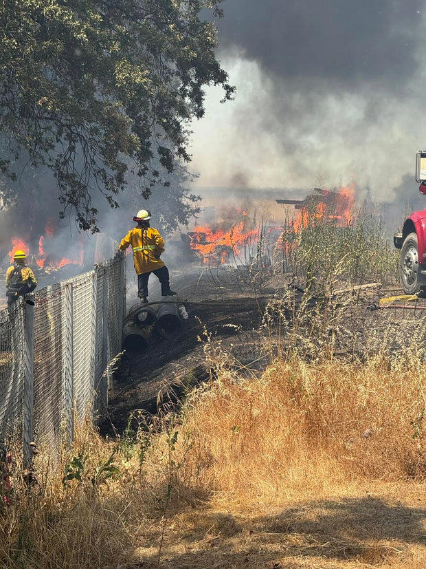 Woodland firefighters battling grass fires along Highway 113