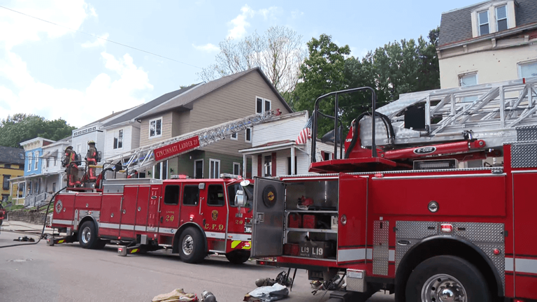 Live wires keep firefighters from entering house on fire in Cincinnati ...