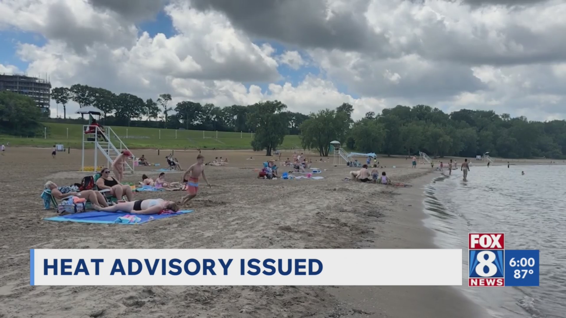 Beachgoers embrace heat at Edgewater Park
