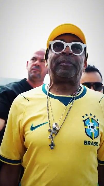 Spike Lee visits Brazil training wearing green and gold