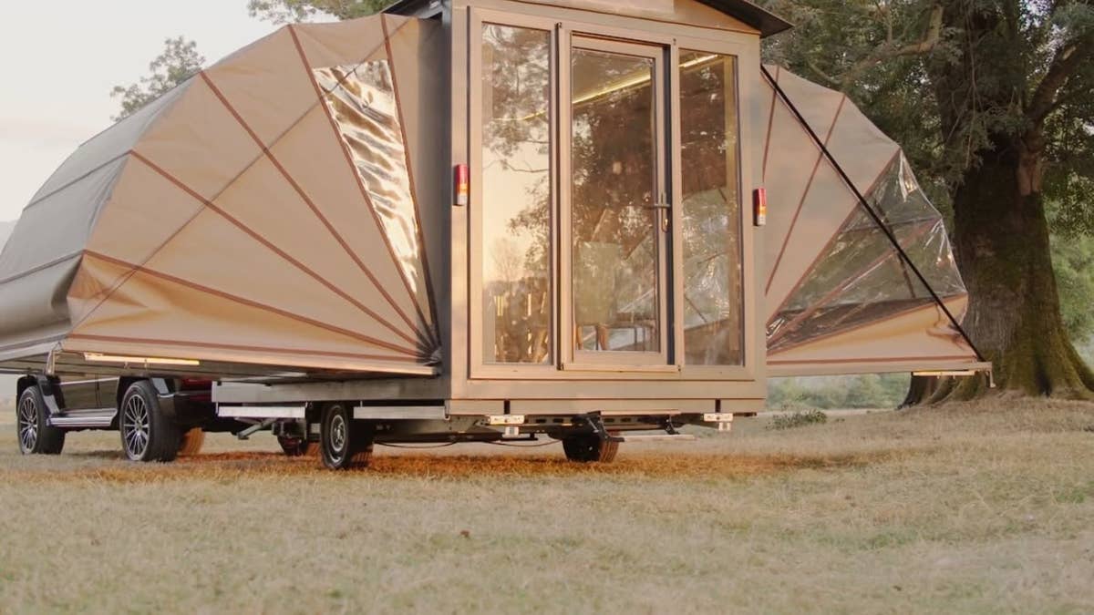This compact camper opens like an accordion and turns into a tiny off ...