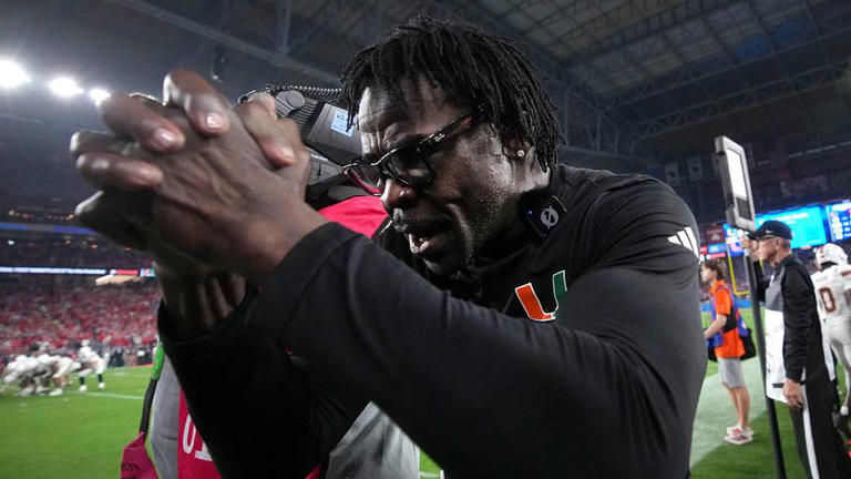 Michael Irvin's passion for Miami washes over recruits during legends camp