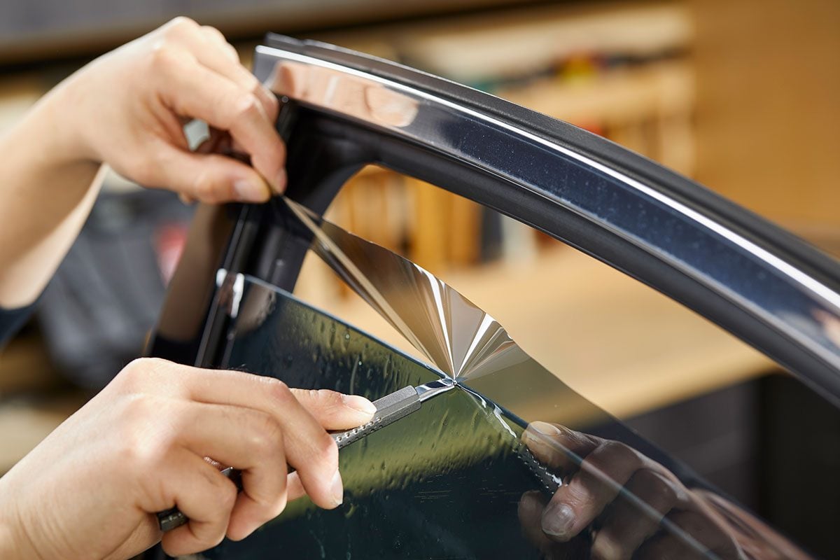 Save money by tinting your own car windows like a pro