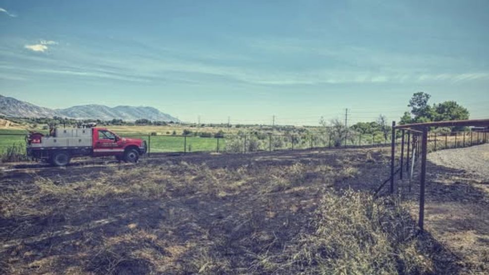 Fast-moving grass fire threatens structures near Tremonton