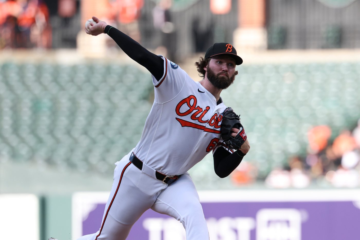 Holliday hits grand slam and Young pitches Orioles past Mariners 7-2 to ...