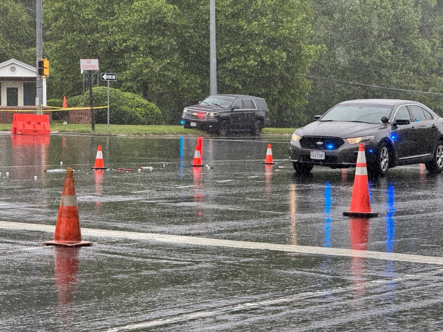 Woman pleads guilty to ramming through CIA gate, driving over double ...