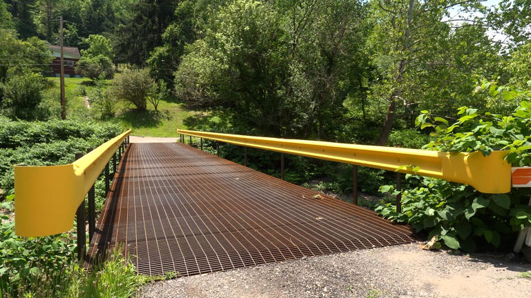 Nearly 100-year-old bridge wiped out by last year’s deadly flash ...
