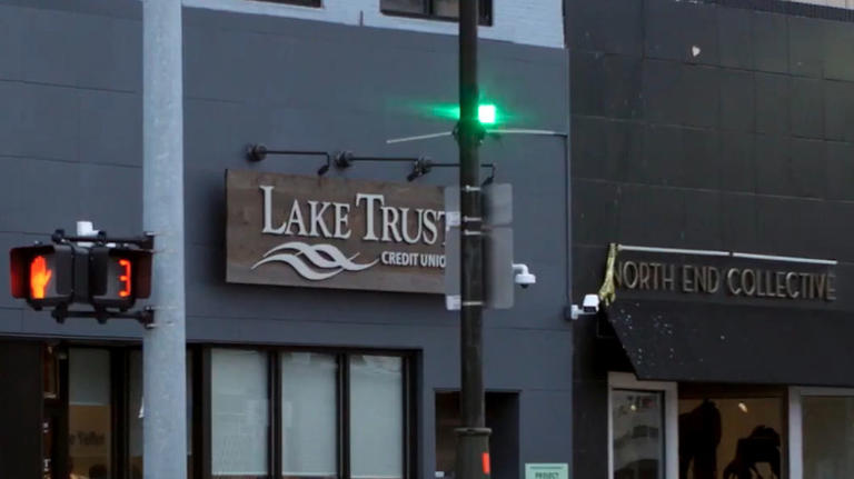 Why do buildings in Detroit have flashing green lights?