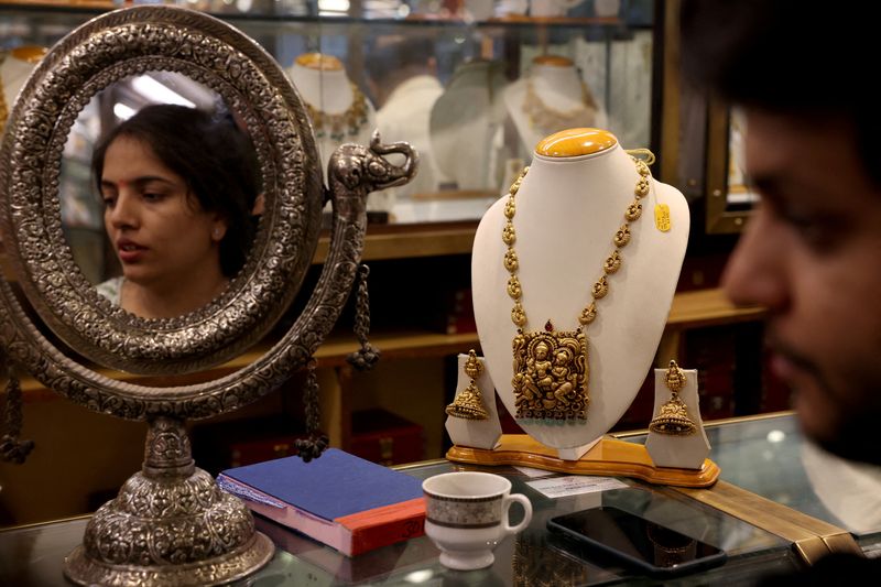 Gold rebounds from six-month low but rate-hike fears cap gains